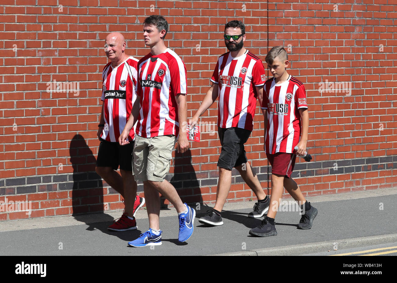 Sheffield United fans make their way to the stadium prior to the ...