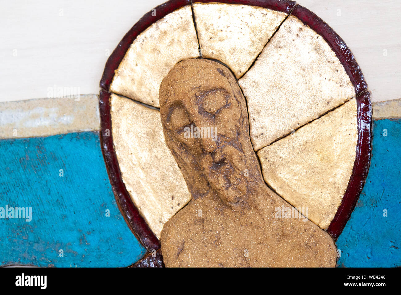A relief sculpture of Jesus' face. Made out of modelling clay by Lubo ...
