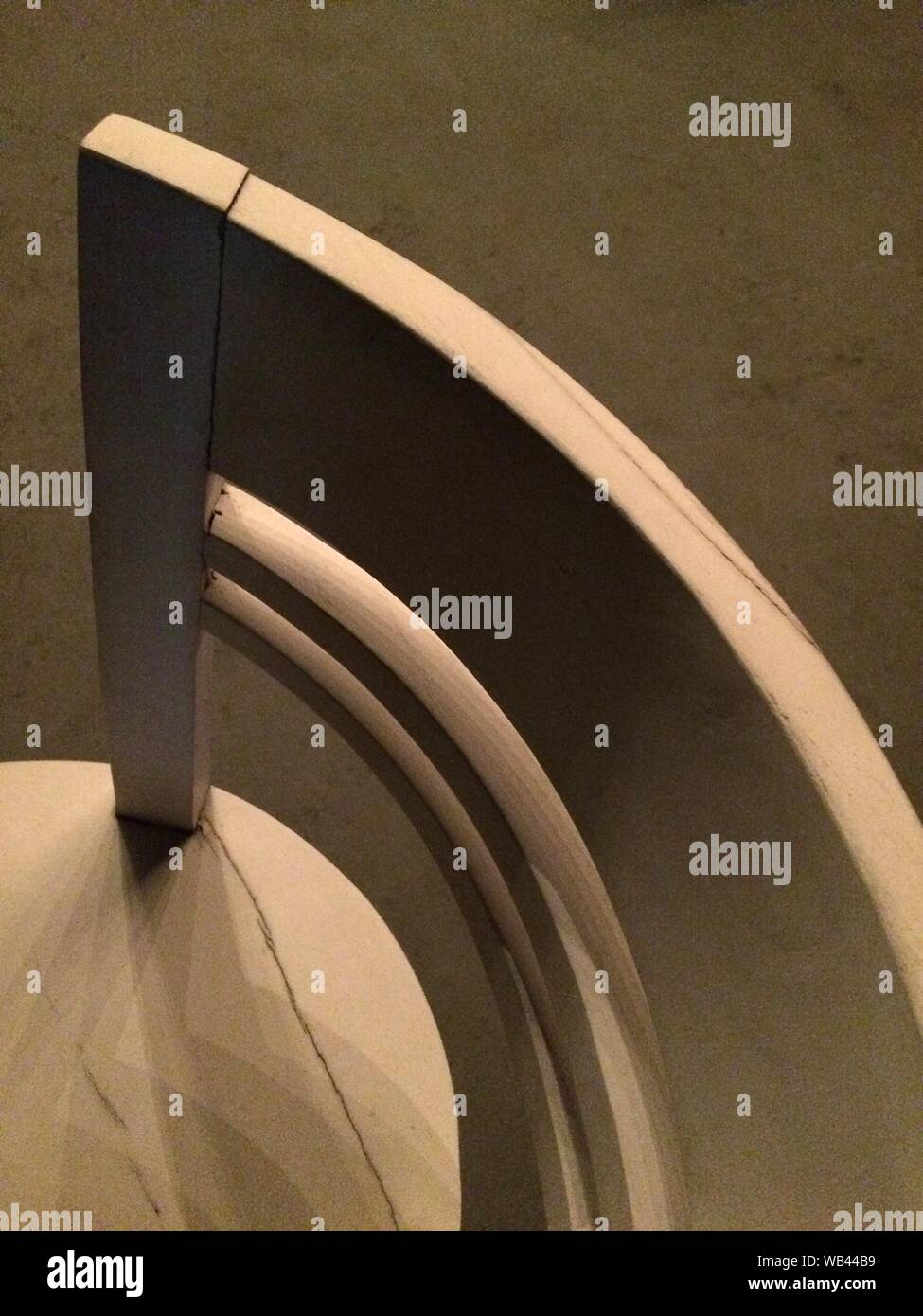 Vertical over headshot of a white chair on a brown carpet Stock Photo ...