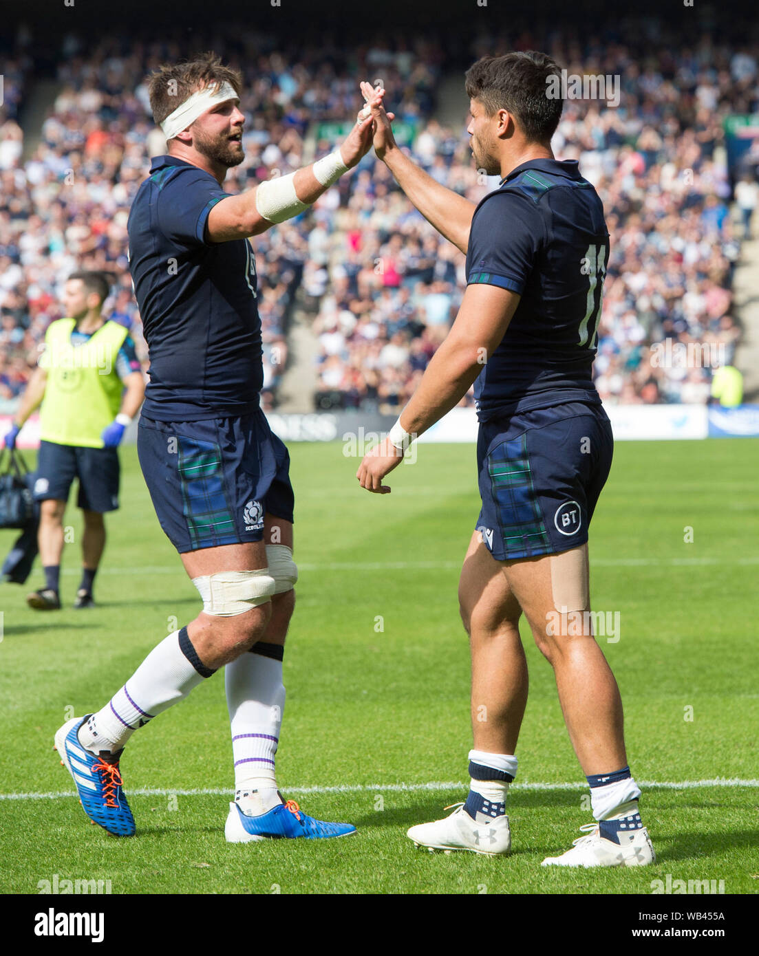 Scotland's Sean Maitland is congratulated by Scotland's Ryan Wilson ...