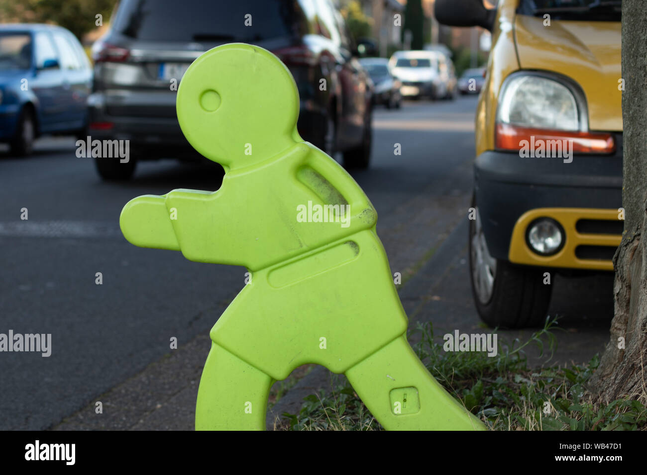 figure as a symbol of caution Children on the street Stock Photo - Alamy