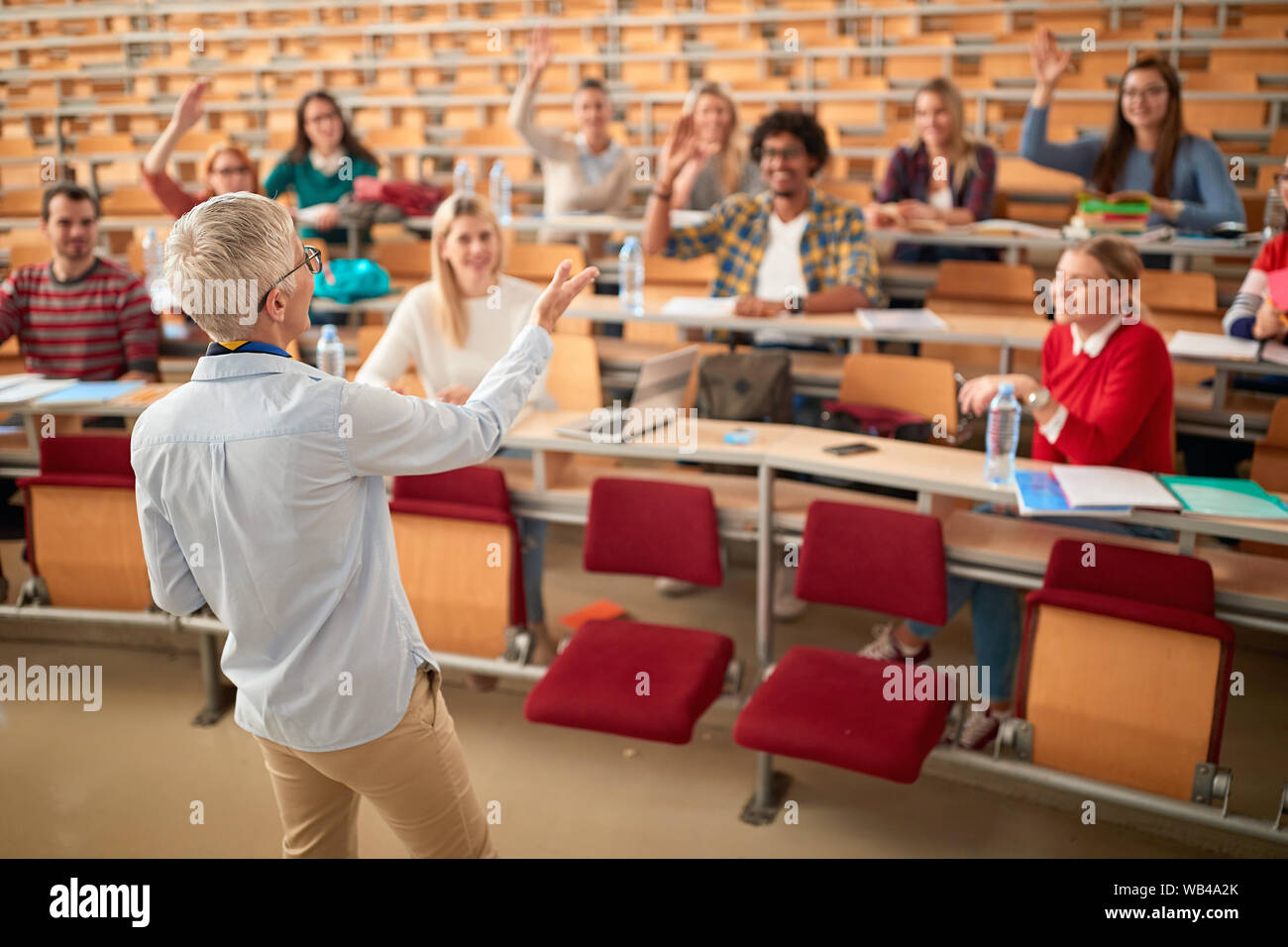 Professor Holding Lecture to a Multi Ethnic Group of Students Stock ...