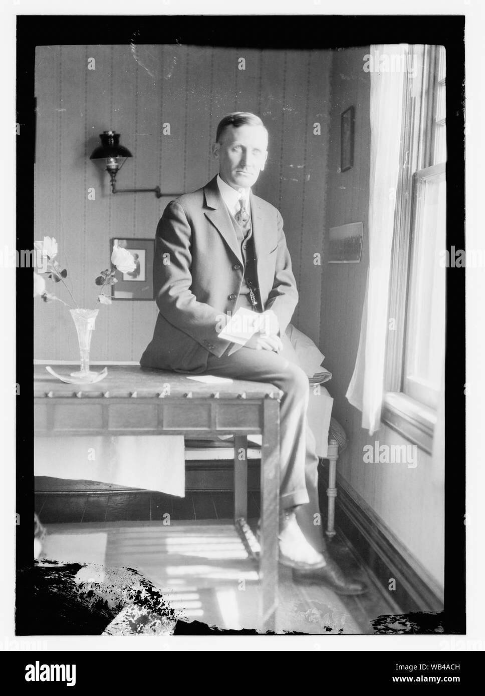 E.M. [i.e., Eric Matson] sitting on edge of desk Abstract/medium: G ...