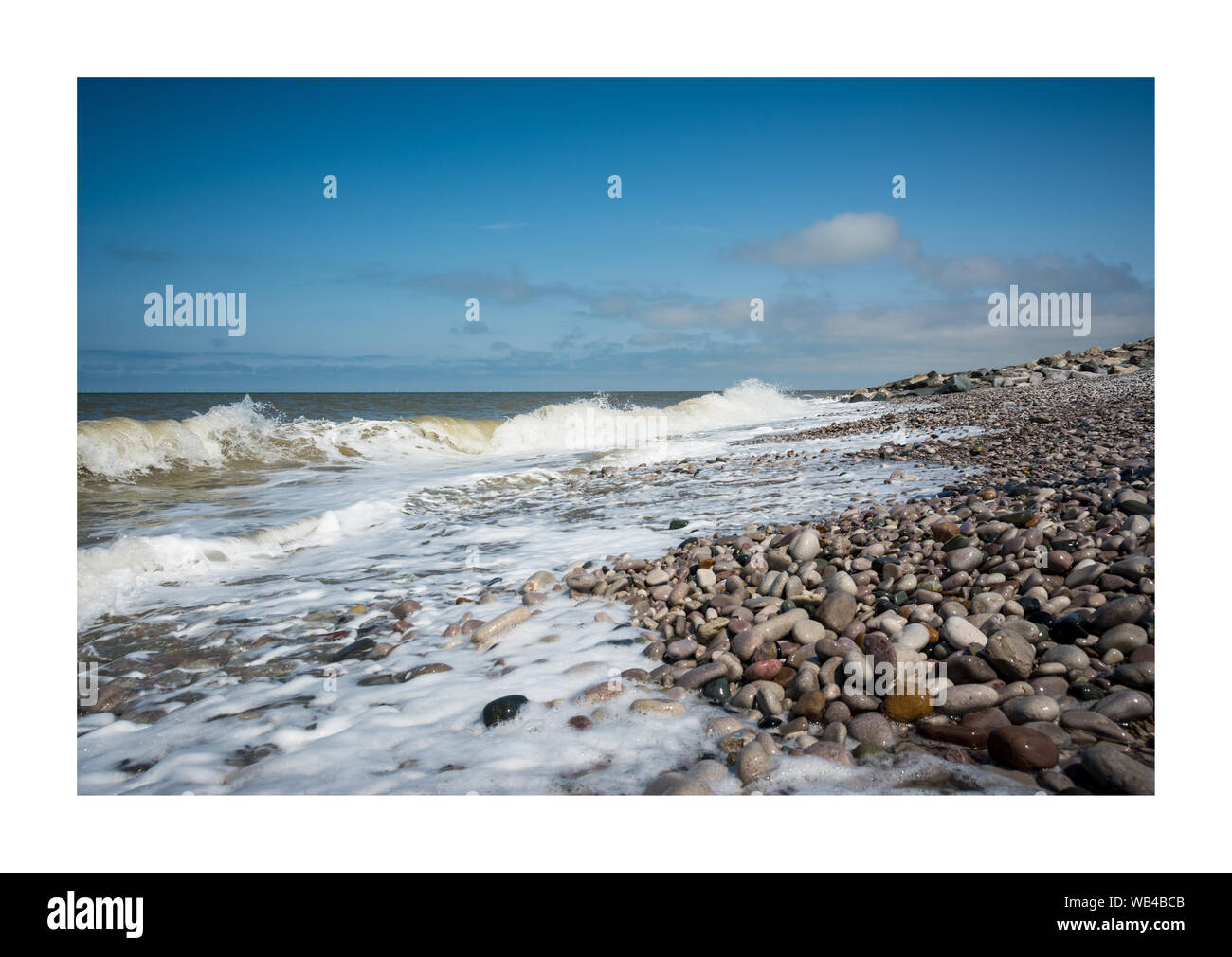 Stoney beach Cut Out Stock Images & Pictures - Alamy