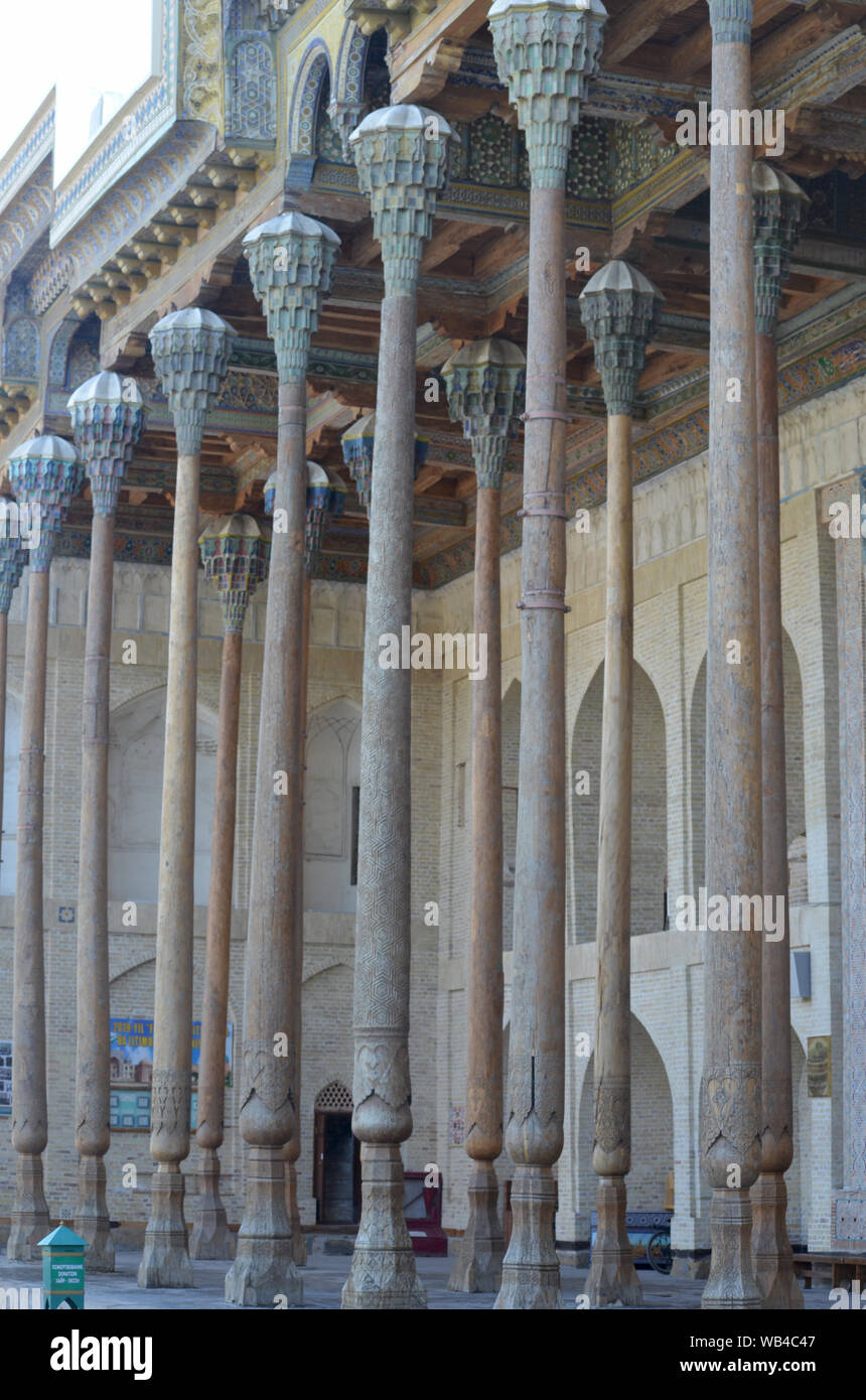 Ornated wooden columns and ceiling of Bolo Haouz Mosque in Bukhara ...