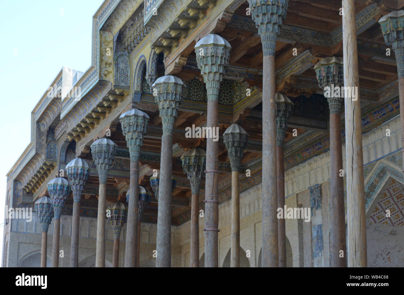 Ornated wooden columns and ceiling of Bolo Haouz Mosque in Bukhara ...