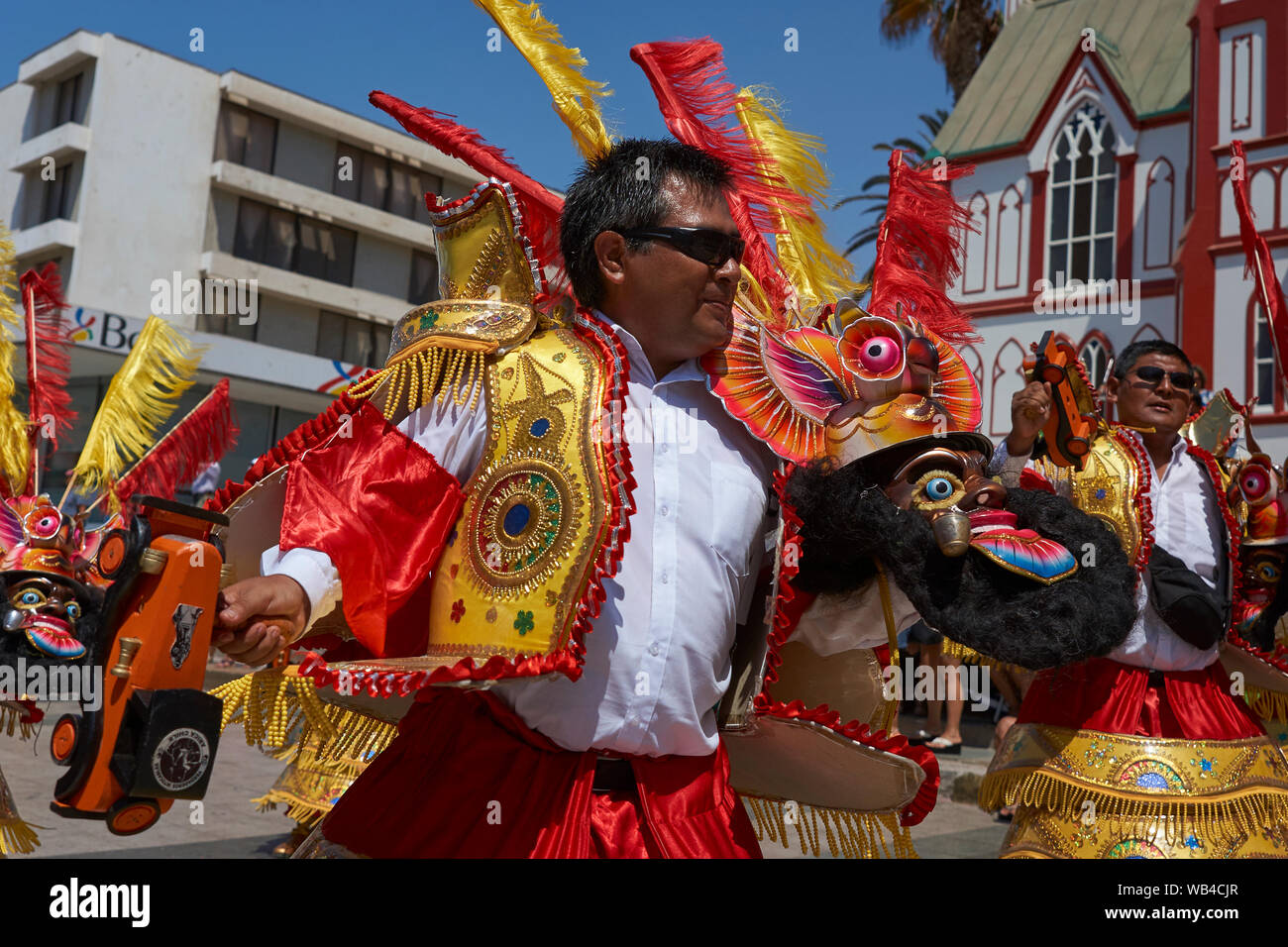 Morenada Dance Group dressed in ornate costumes performing during a ...