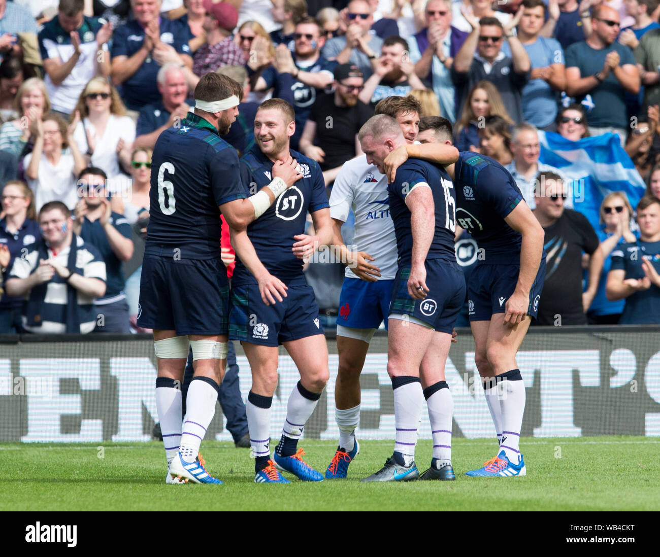 ScotlandÕs Ryan Wilson celebrates with ScotlandÕs Finn Russell after ...