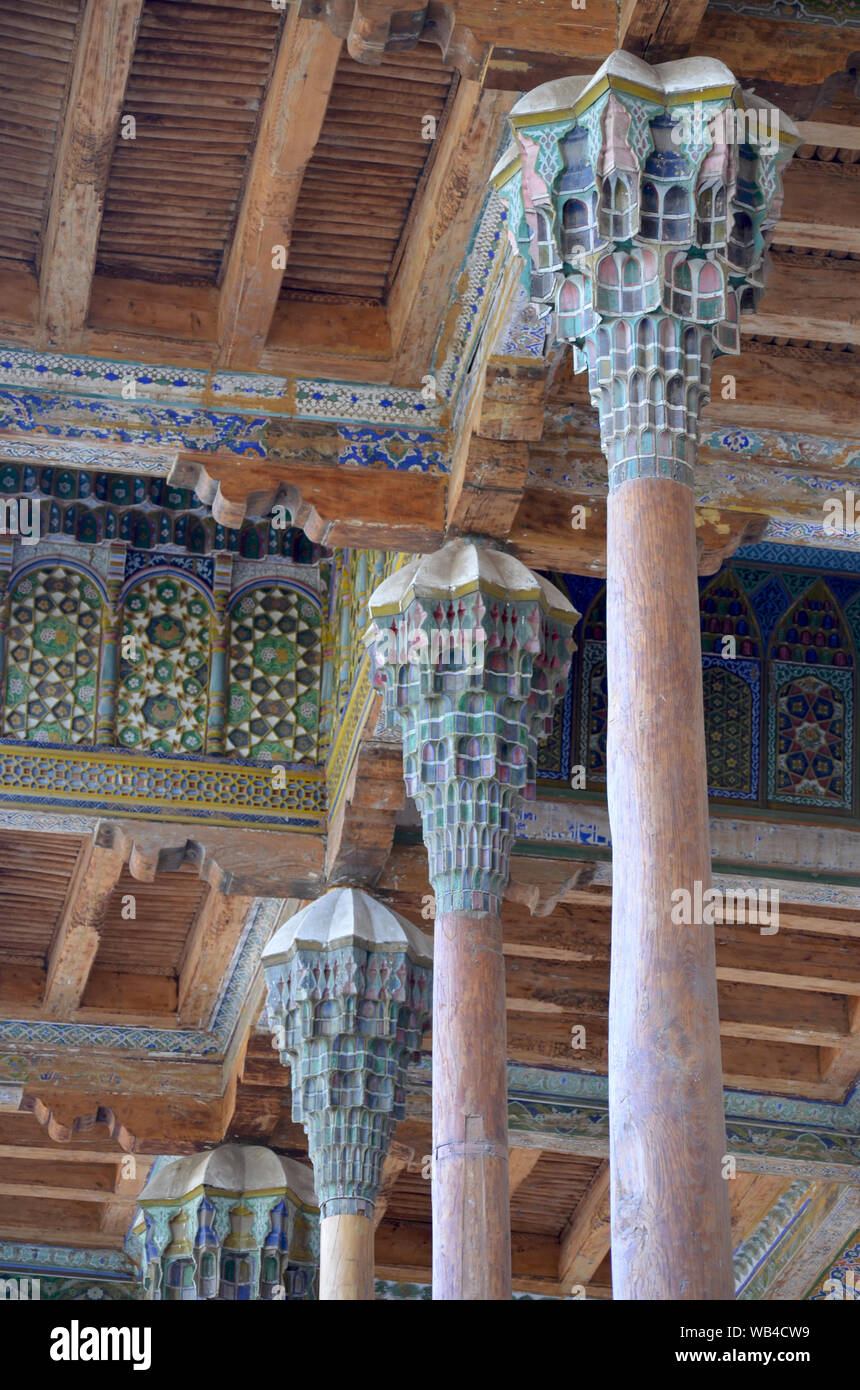 Ornated wooden columns and ceiling of Bolo Haouz Mosque in Bukhara ...