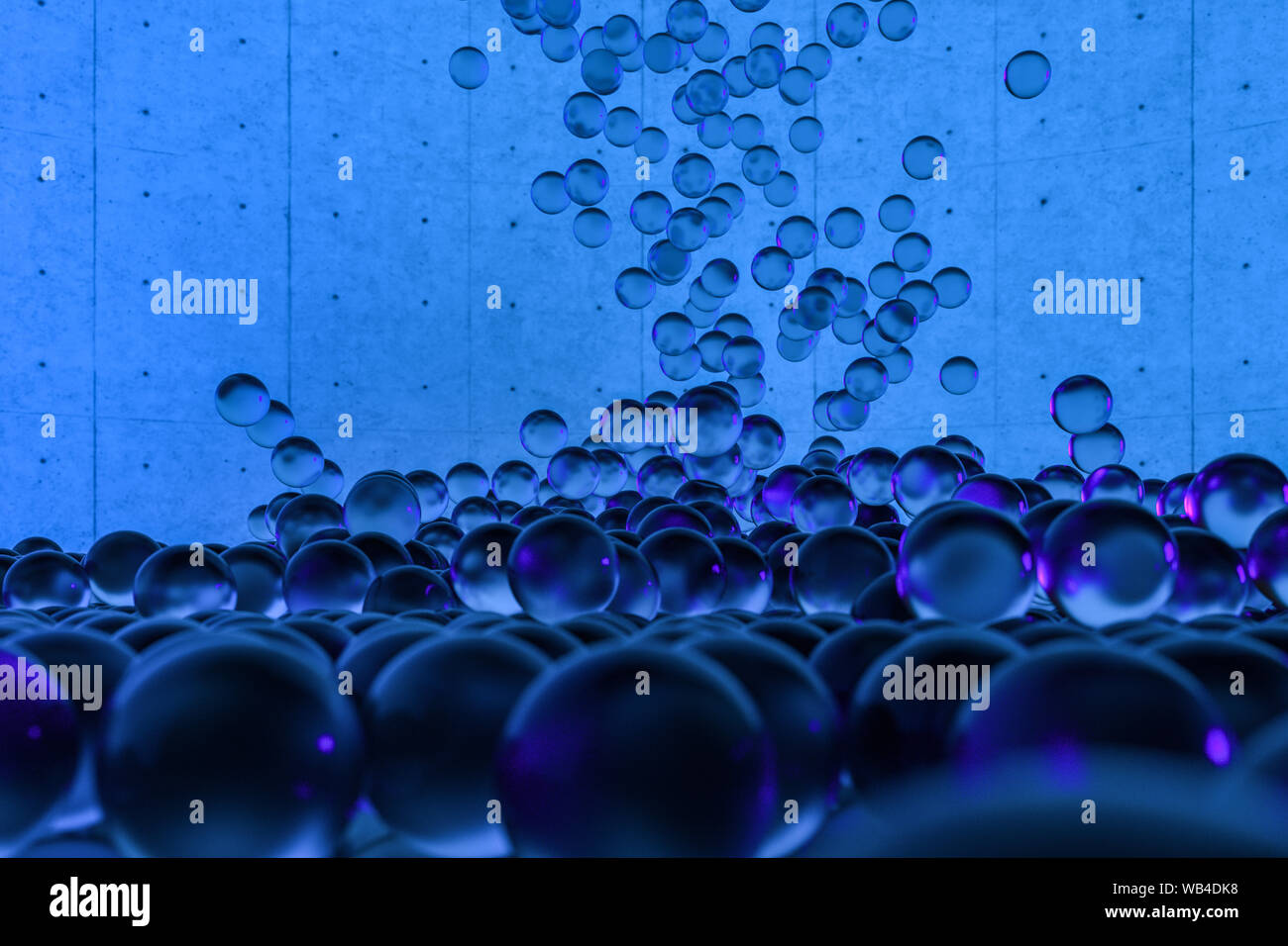 A mass of spheres falling down from above, 3d rendering. Computer ...