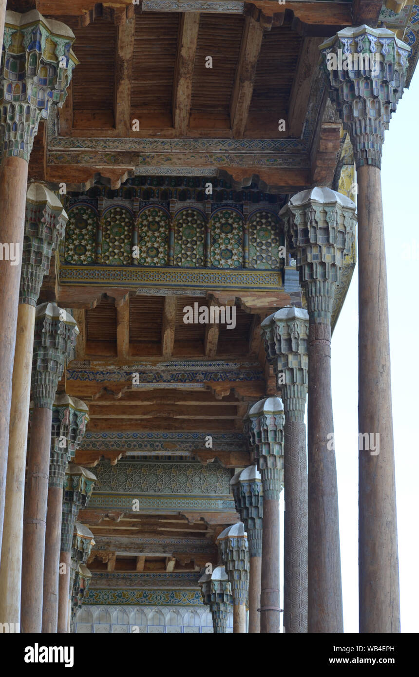 Ornated wooden columns and ceiling of Bolo Haouz Mosque in Bukhara ...