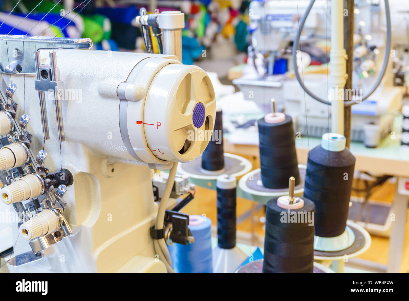 fragment of the interior of a sewing workshop with various equipment ...