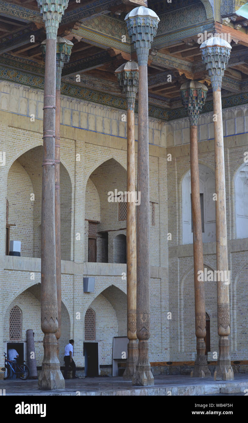 Ornated wooden columns and ceiling of Bolo Haouz Mosque in Bukhara ...