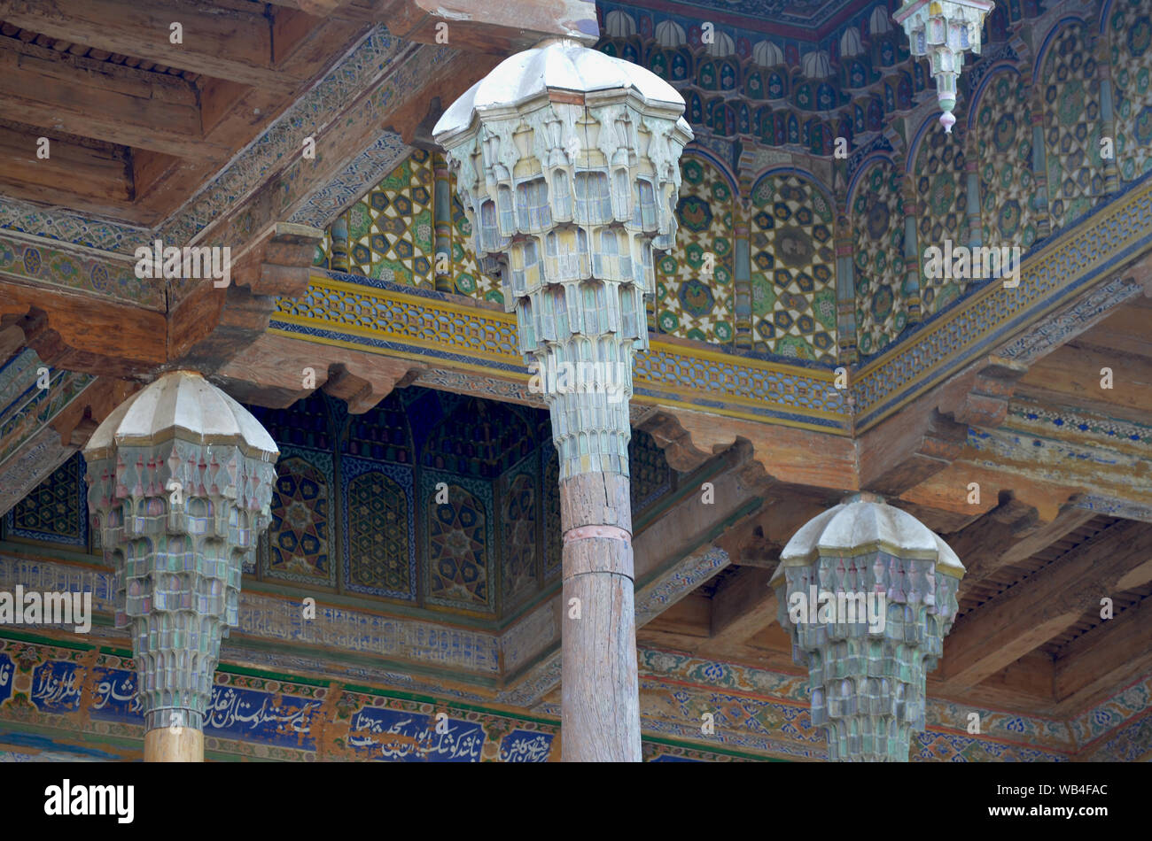 Ornated wooden columns and ceiling of Bolo Haouz Mosque in Bukhara ...