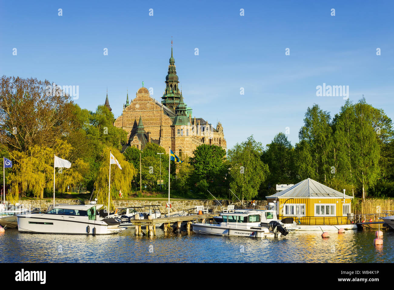 Crowded floating dock-restaurants and coffee shops with sports rental ...