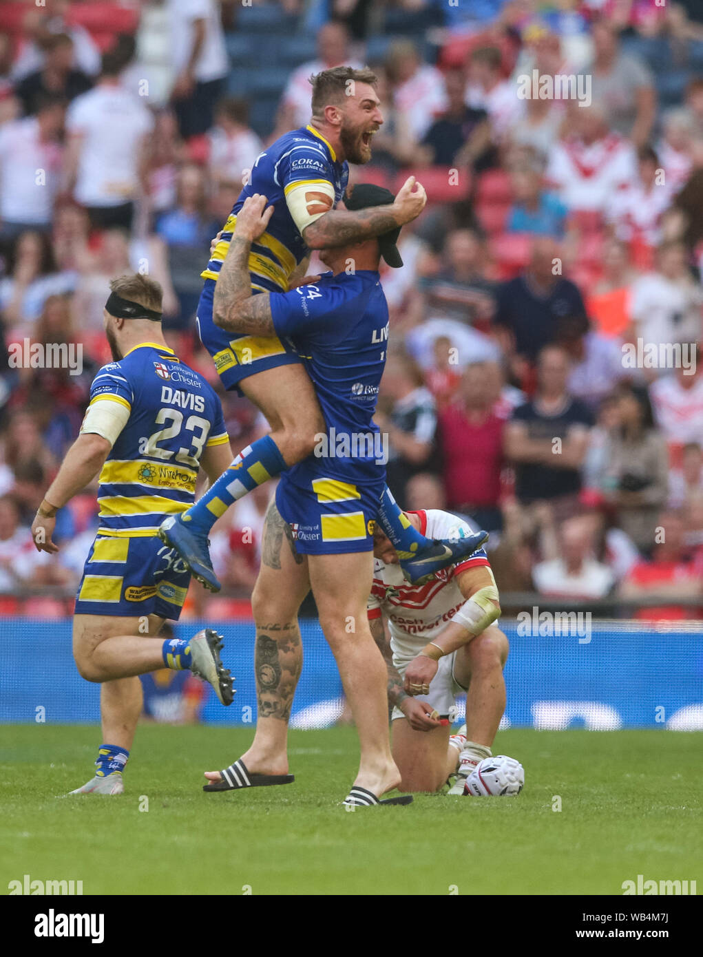Warrington's Daryl Clark celebrates at the end of the Coral Challenge ...