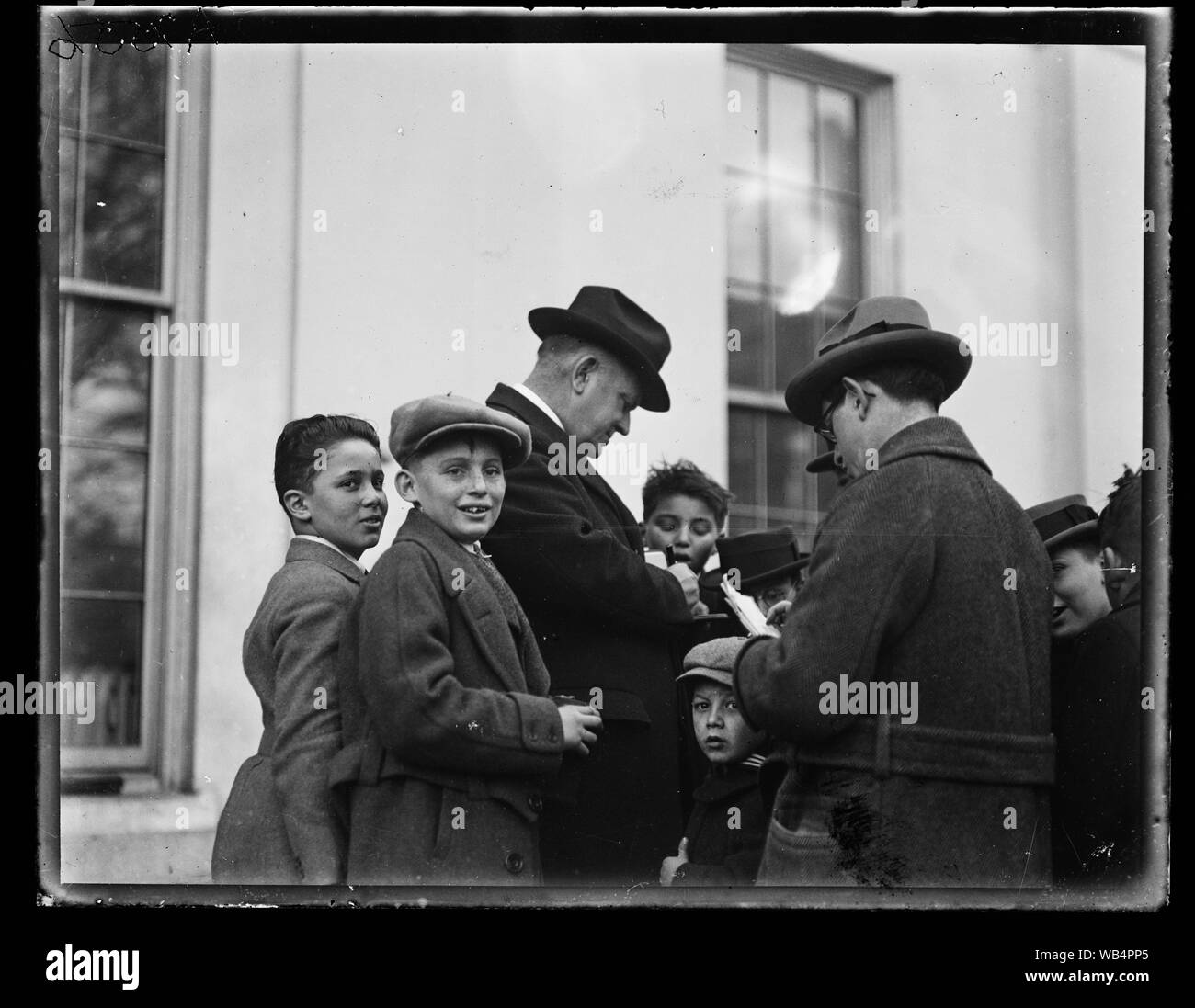 Edwin Denby with group of children outside White House, Washington, D.C ...