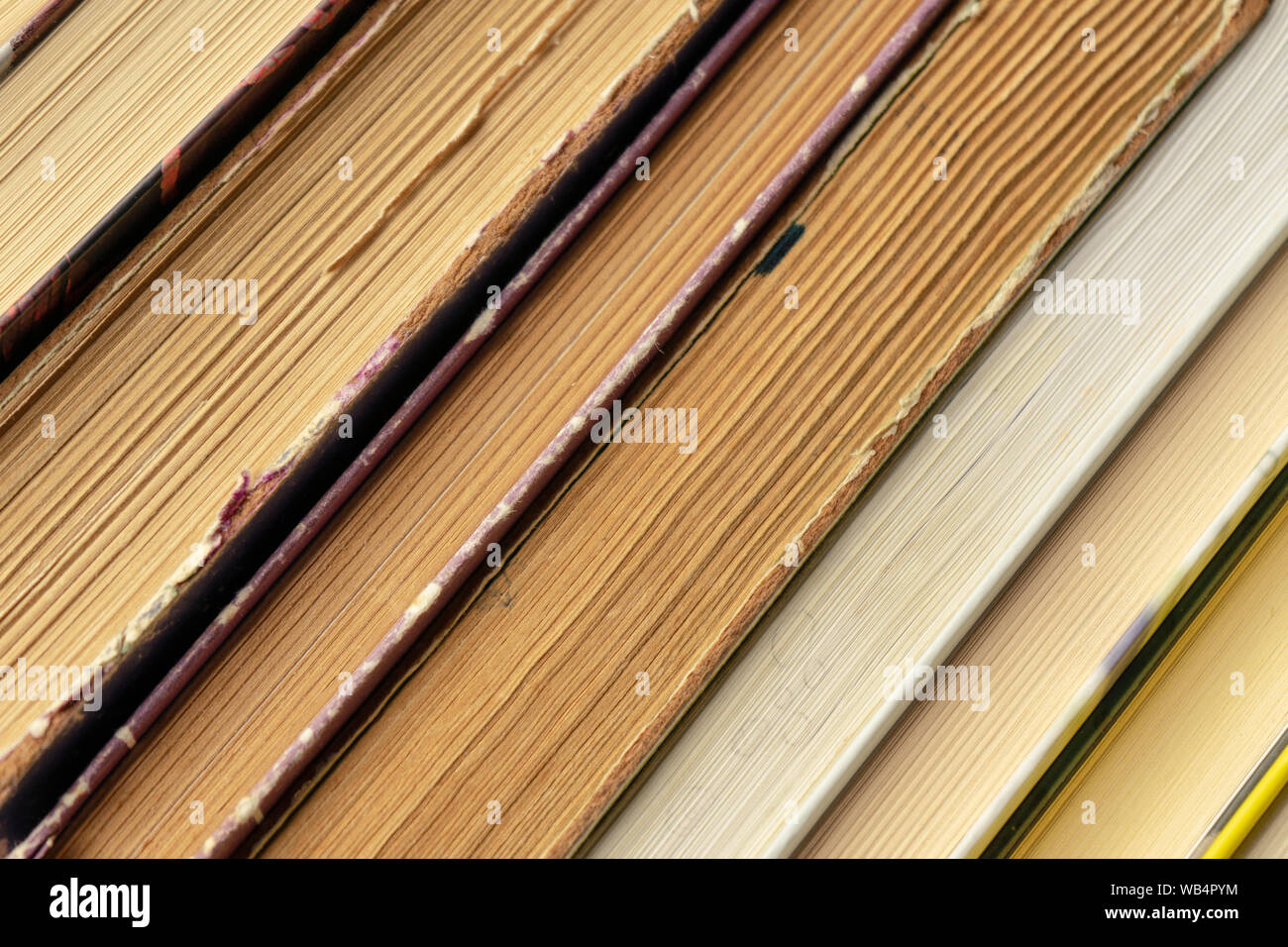 Stacked old books. Book texture, background Stock Photo - Alamy