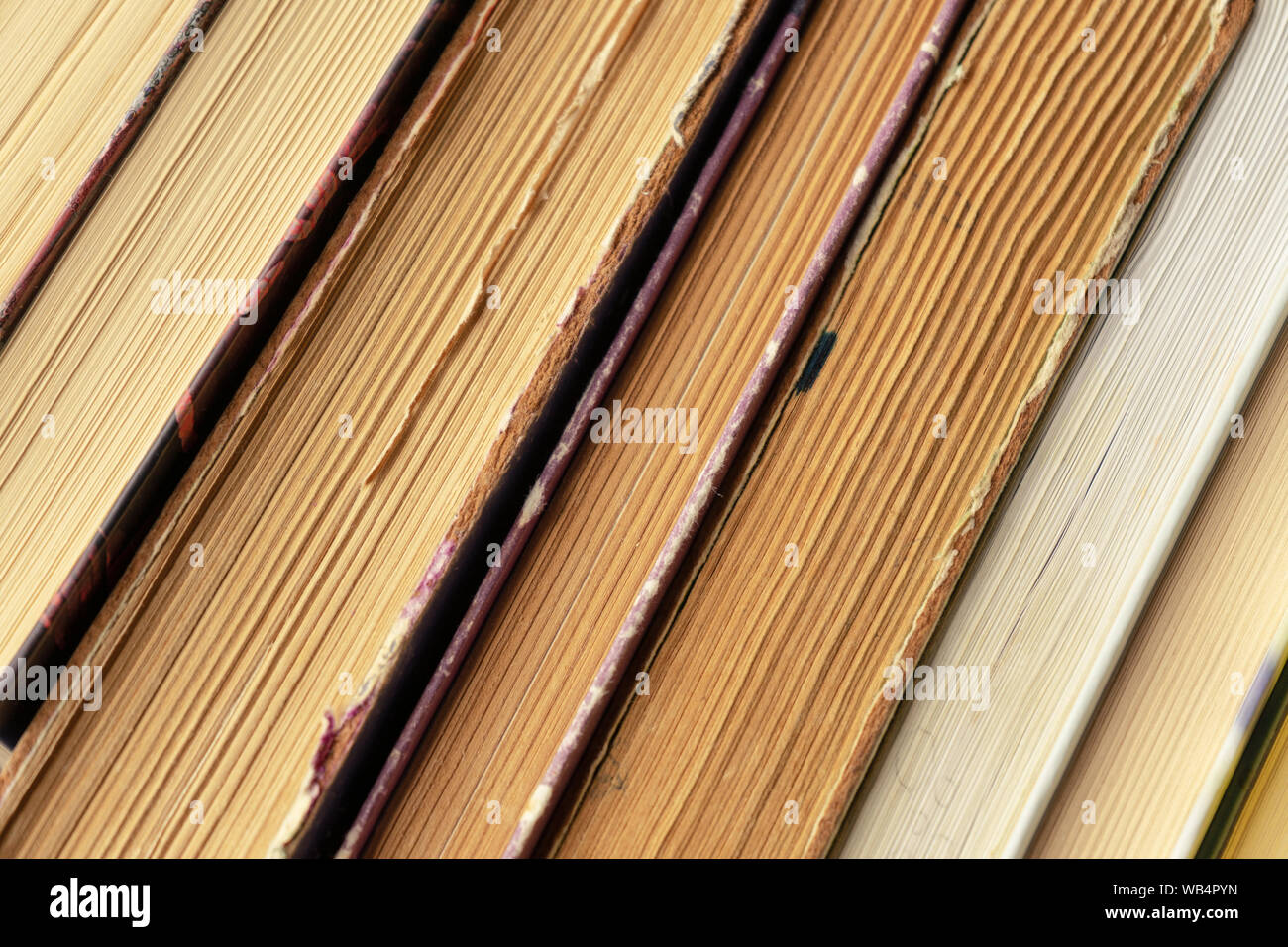 Stacked old books. Book texture, background Stock Photo - Alamy