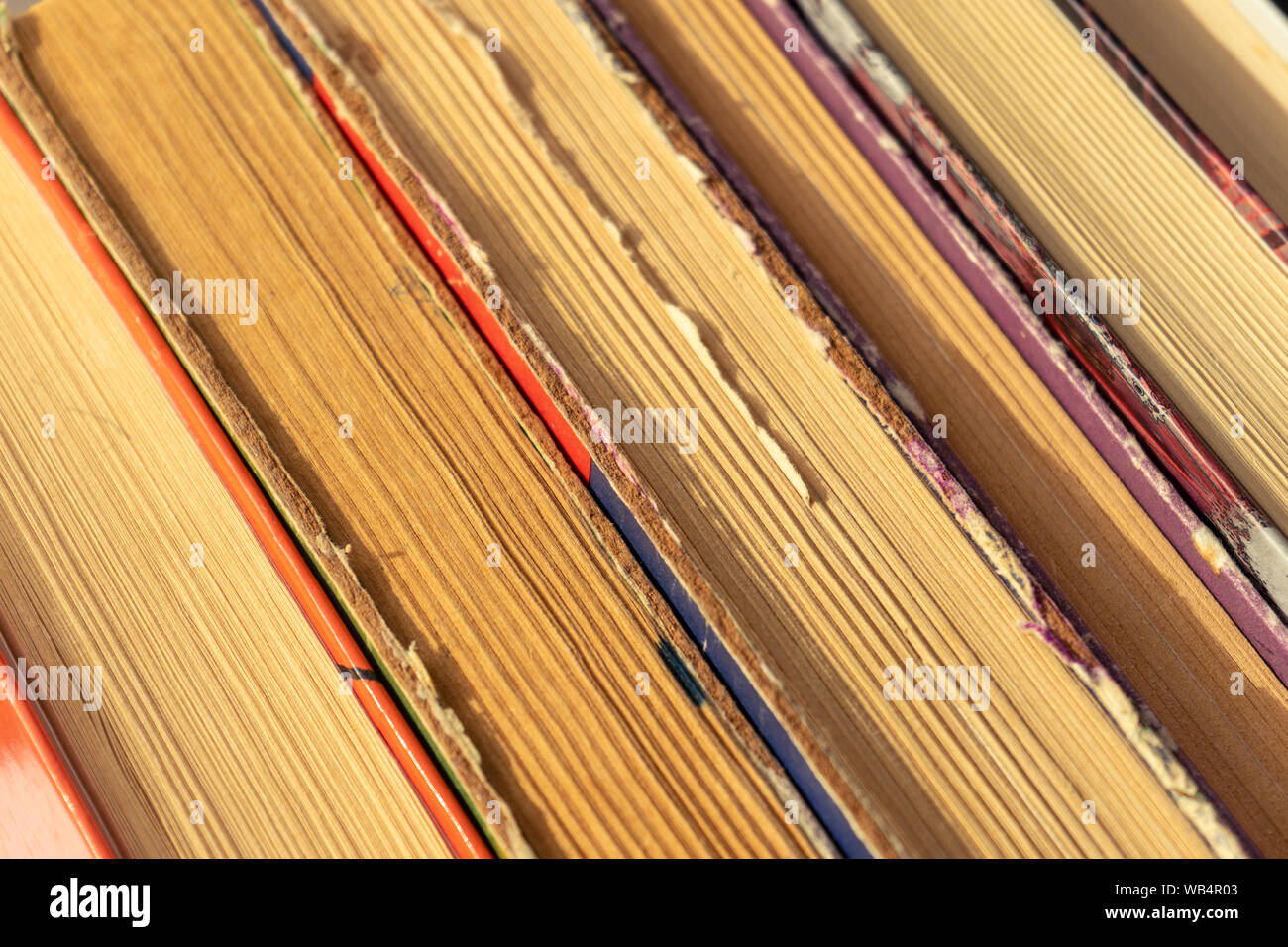 Stacked old books. Book texture, background Stock Photo - Alamy