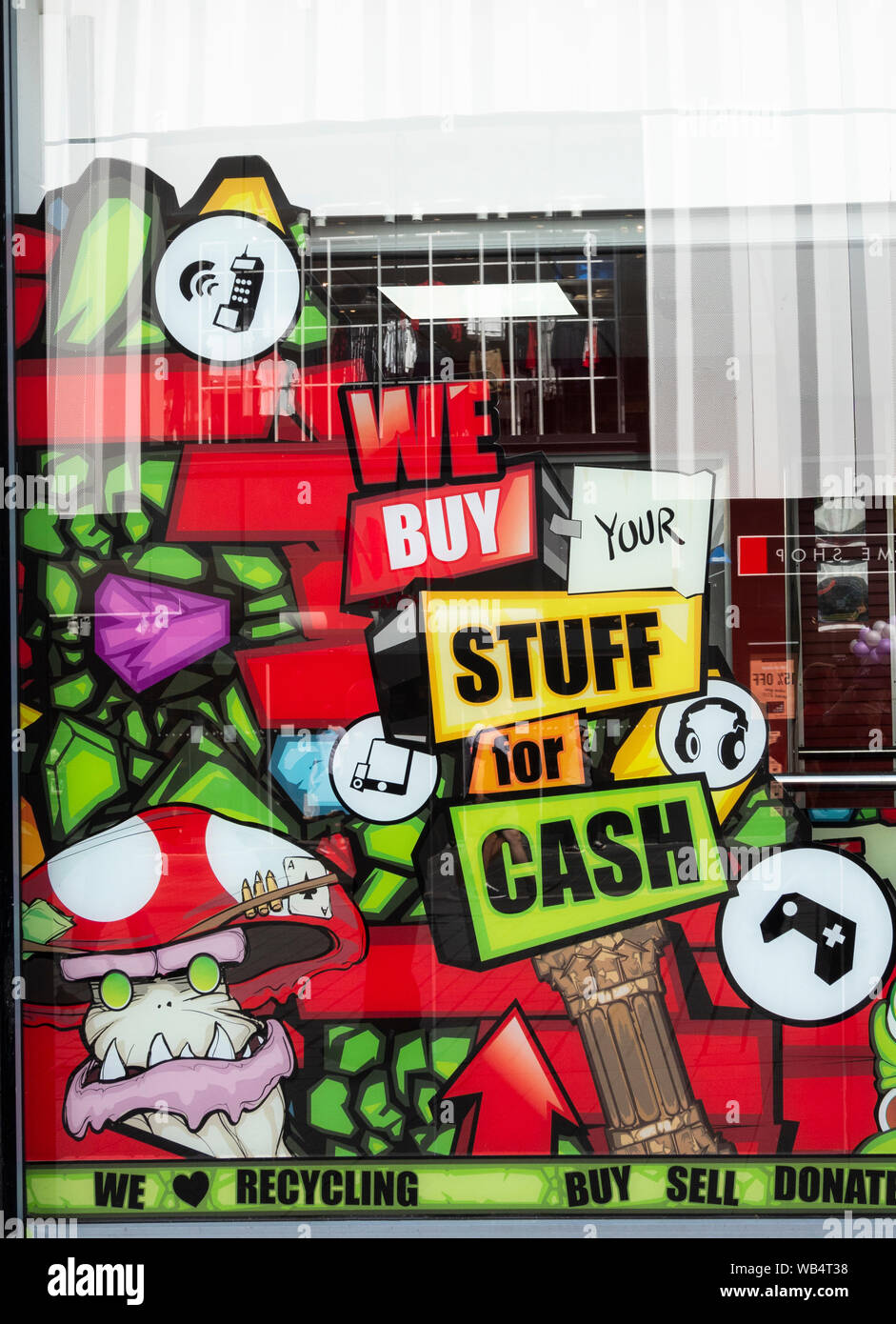 Window of a secondhand shop in Liverpool Stock Photo - Alamy