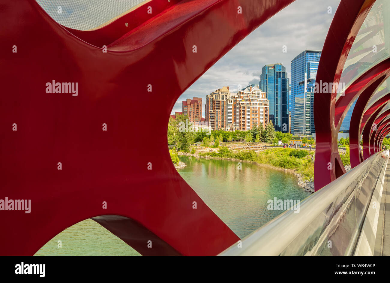 Calgary downtown seen through the structure of the Peace Bridge at ...