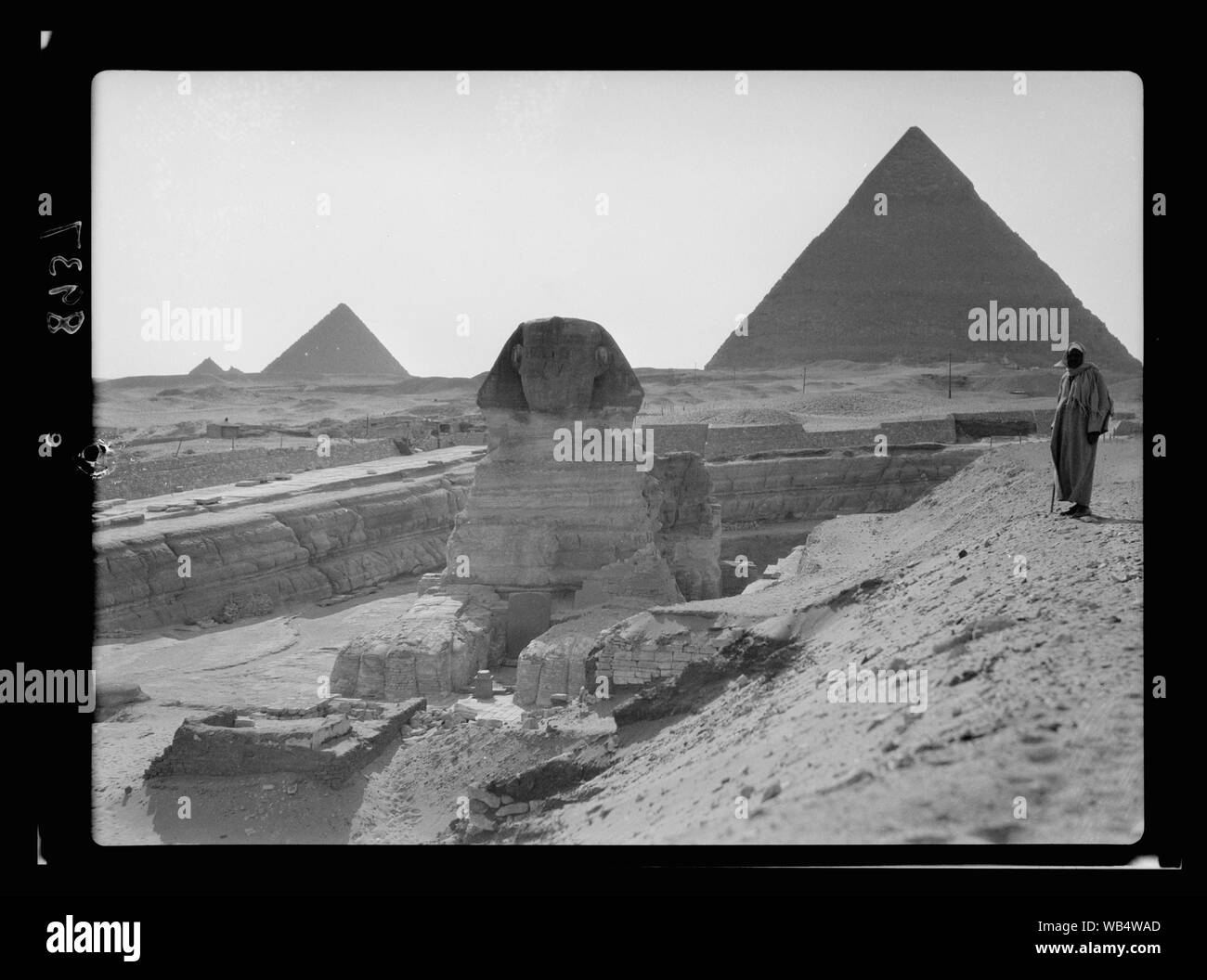 Egypt. Sphinx & pyramids. Sphinx (front view with two pyramids in ...