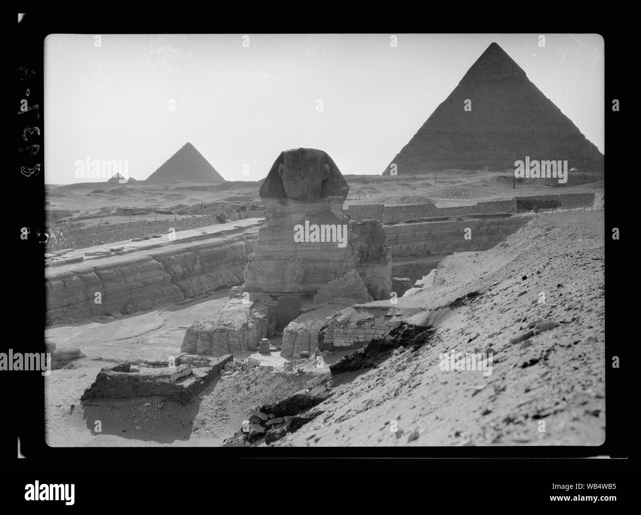 Egypt. Sphinx & pyramids. Sphinx (front view with two pyramids in ...