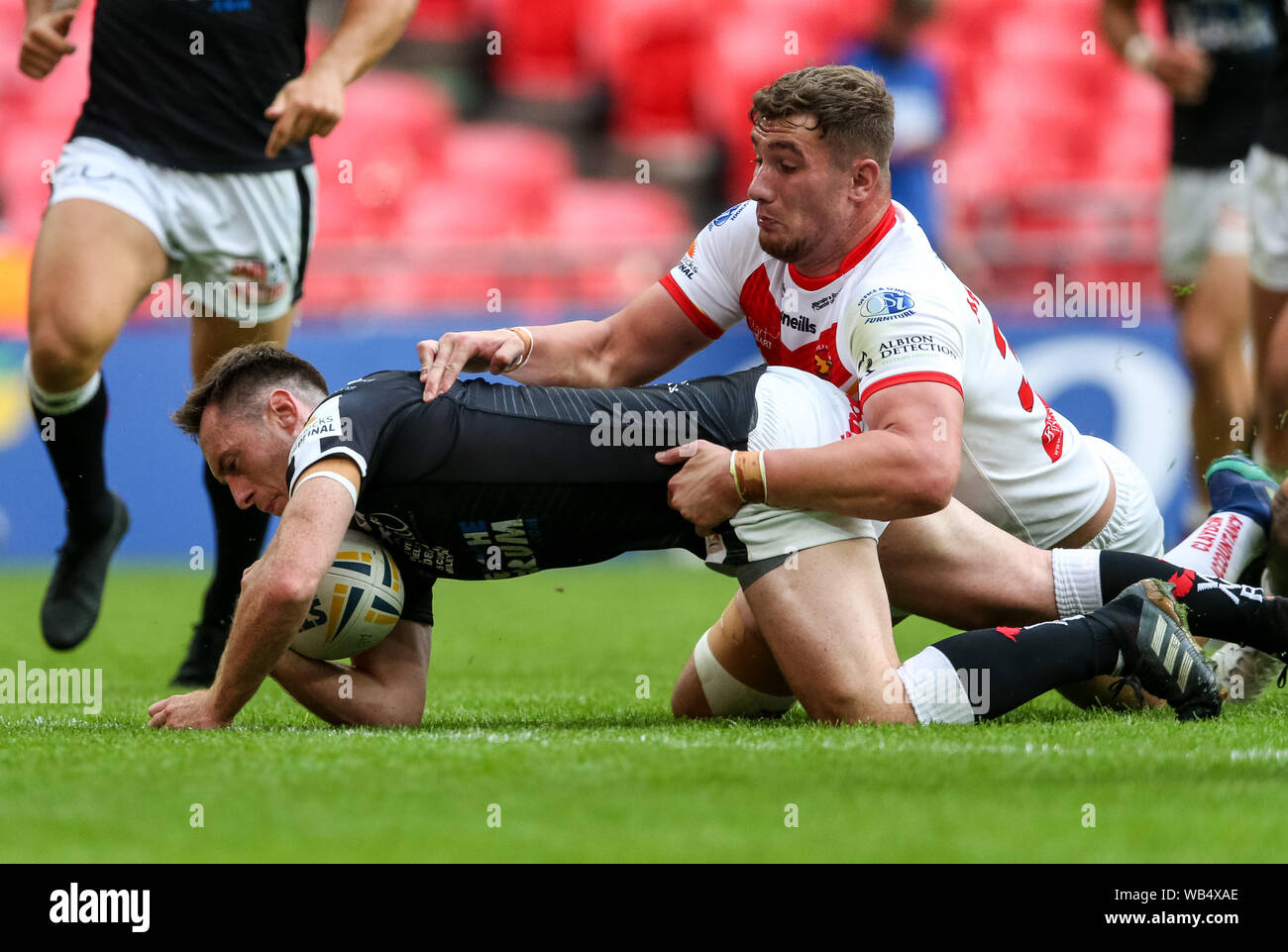Widnes' Thomas Gilmore scores a try during the 1895 Cup Final at ...