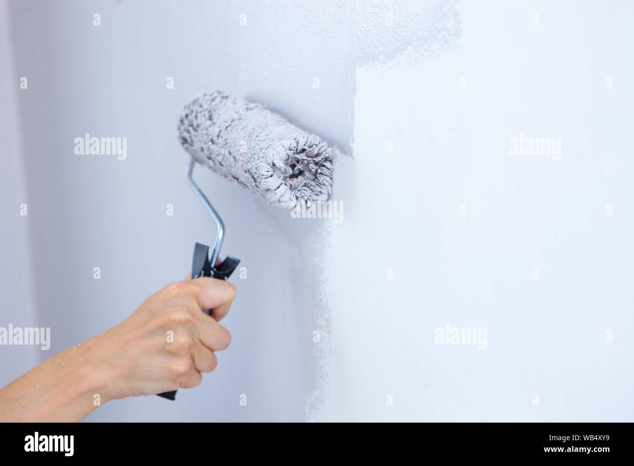 Repainting walls. Interior design and decoration. Home improvement ...