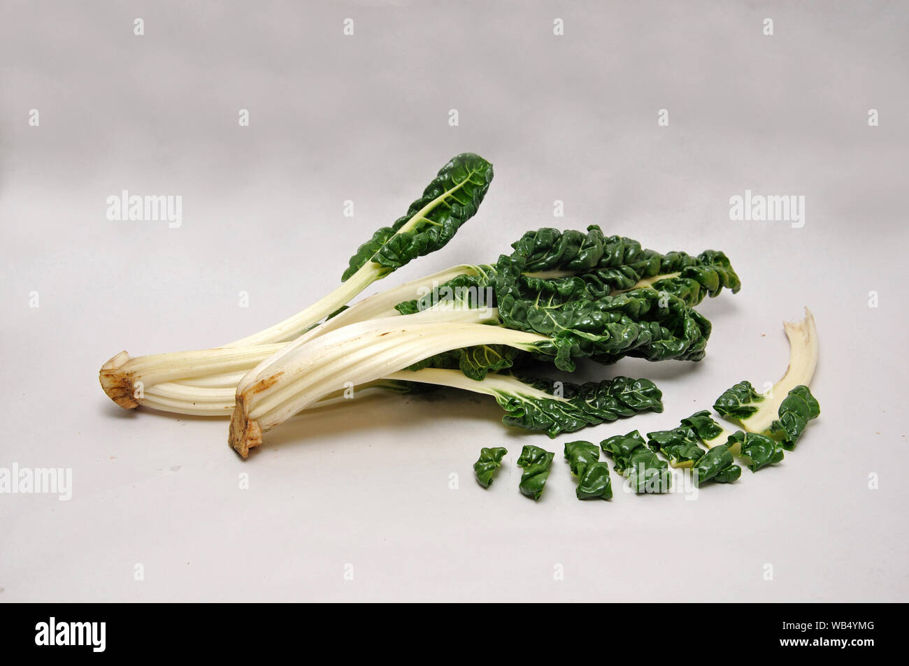 whole and sliced silverbeet on a seamless background Stock Photo - Alamy