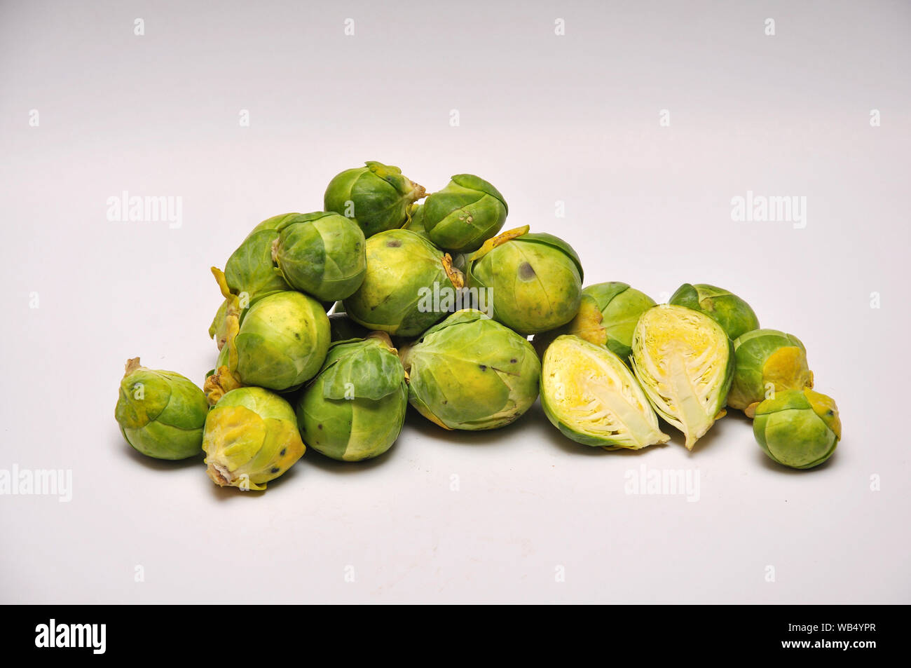 whole and sliced brussel sprouts on a seamless background Stock Photo ...