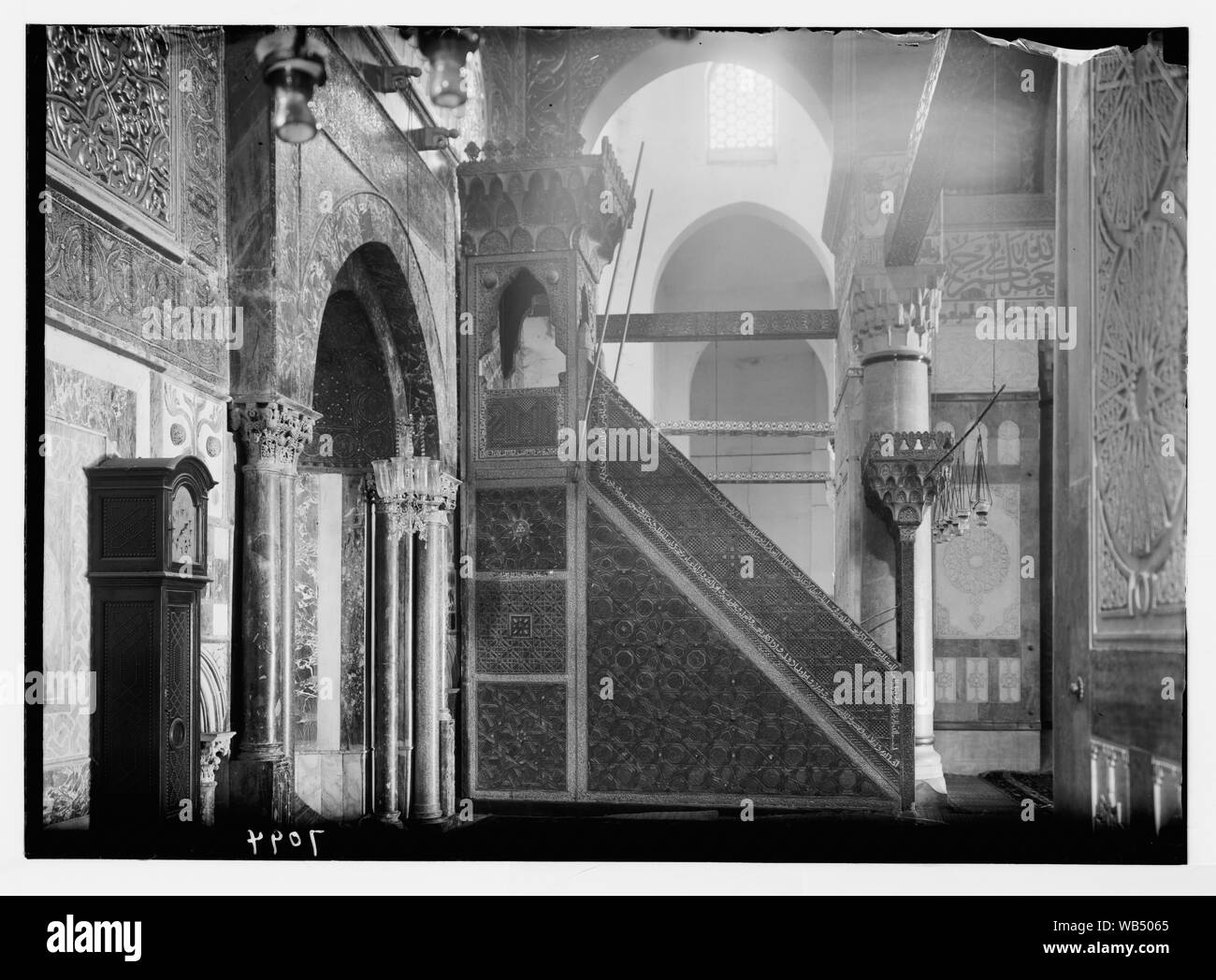 El Aksa [i.e., al-Aqsa] Mosque. Cedar pulpit & mihrab showing old clock ...