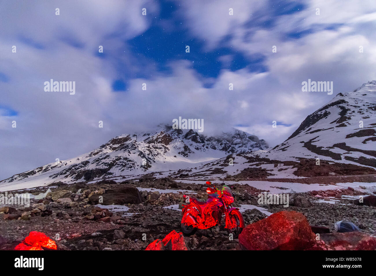 Motorcycle Camping Under Cloudy Starry Night in Ladakh Stock Photo - Alamy