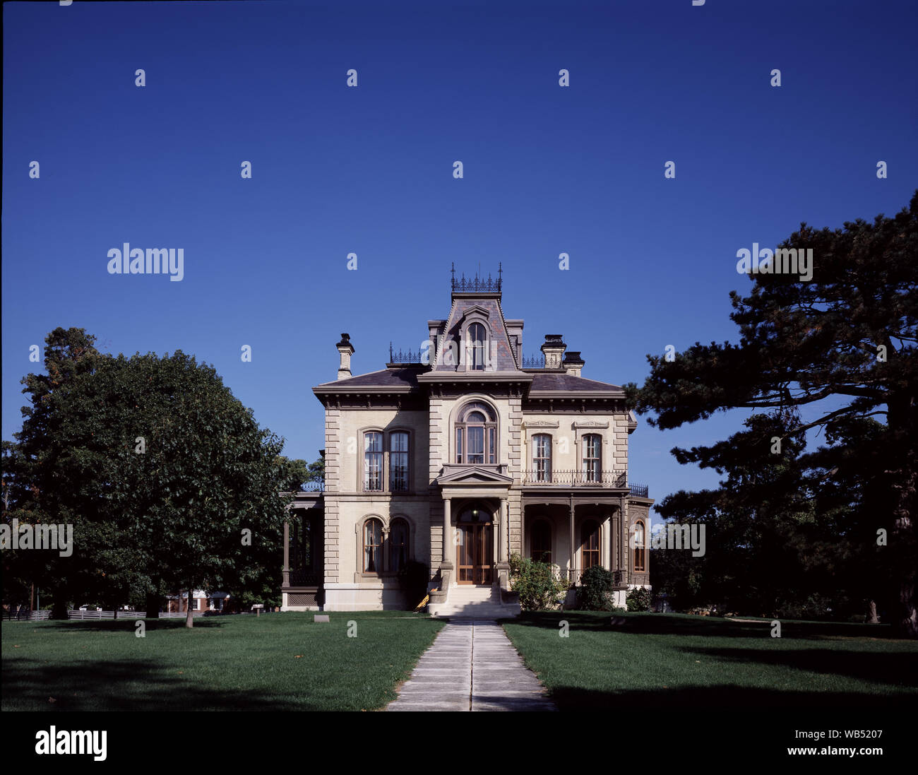 Elegant mansion with a mansard roof Stock Photo - Alamy