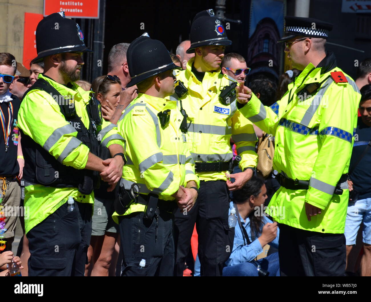 A police officer talks to colleagues before the Manchester, uk, LGBT ...