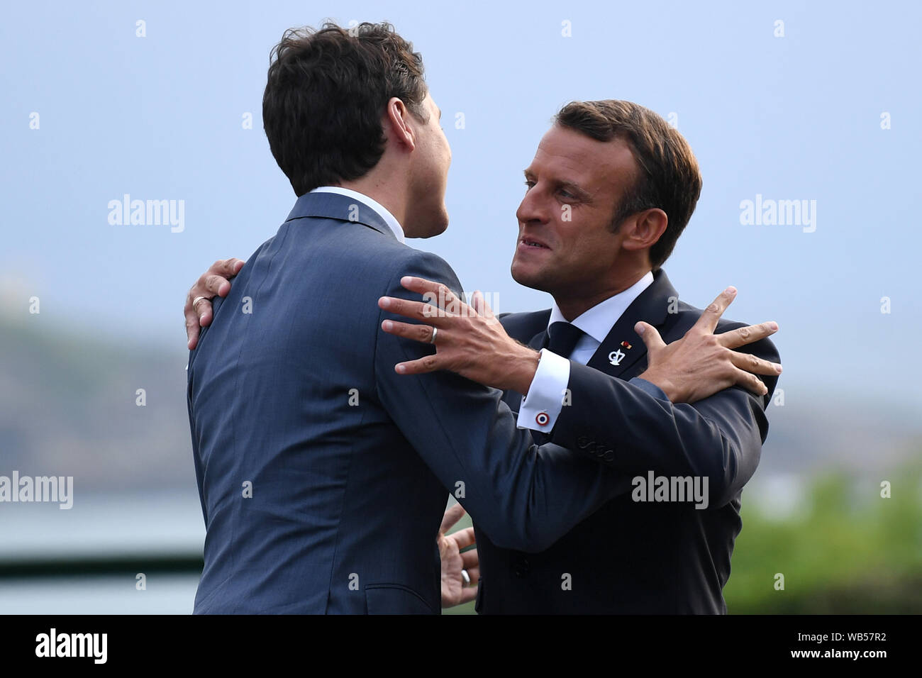French President Emmanuel Macron and his wife Brigitte greet Canadian ...