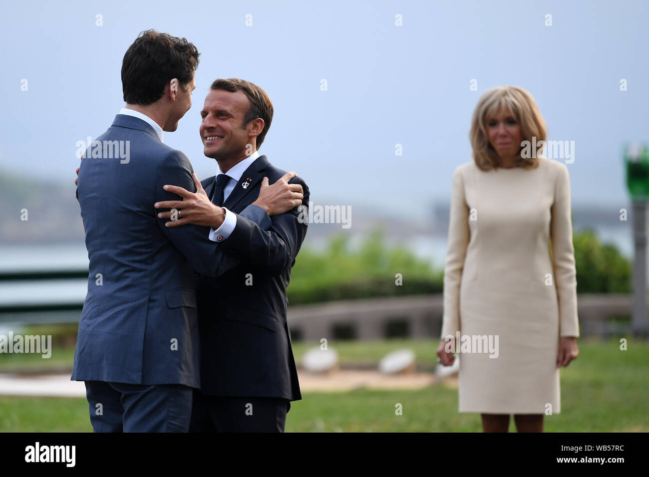 French President Emmanuel Macron and his wife Brigitte greet Canadian ...