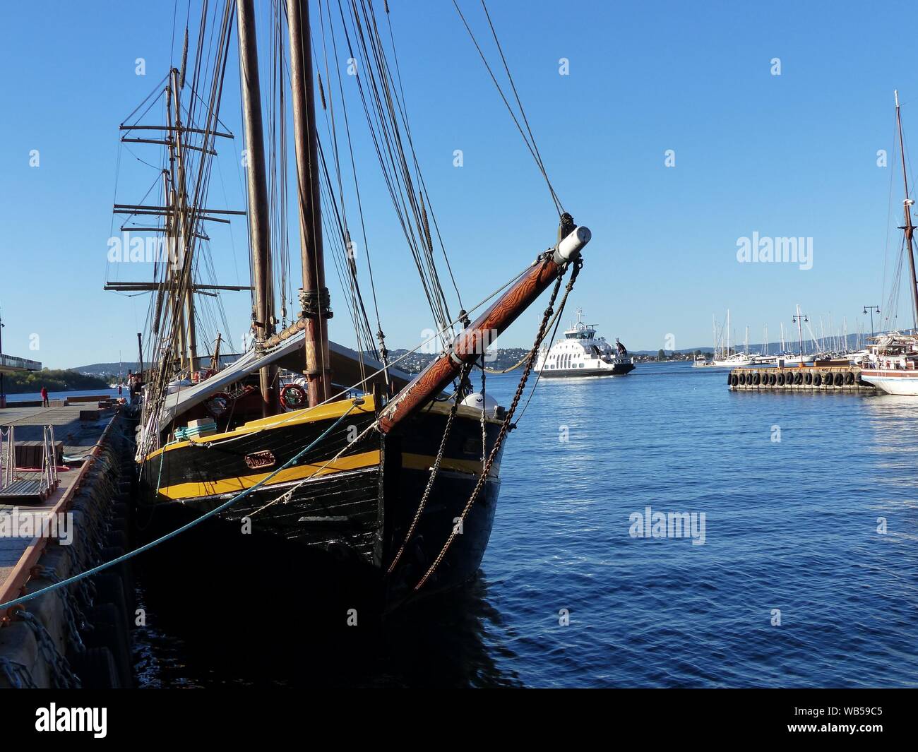Historic tall ships moored at the quay in Oslo old harbour Stock Photo ...