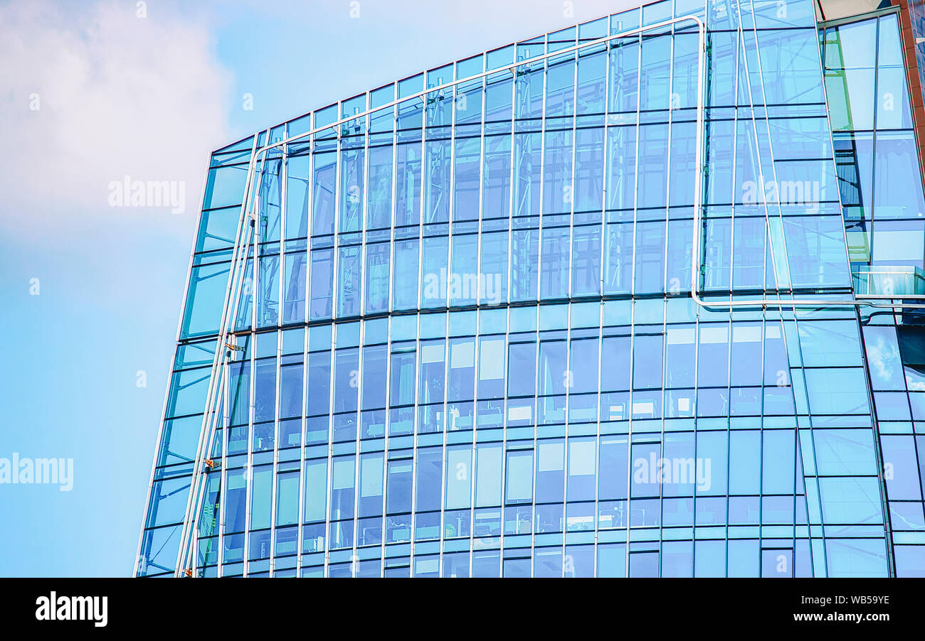 EU Glass windows in the modern office building skyscraper in the ...