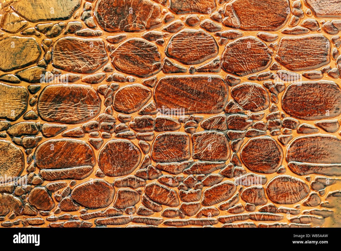 Brown scales macro exotic background, embossed under the skin of a ...