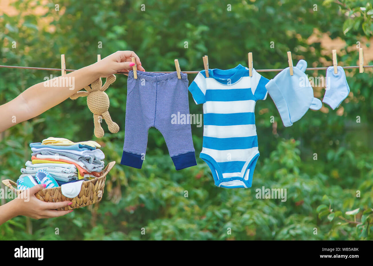 washing baby clothes. Linen dries in the fresh air. Selective focus ...