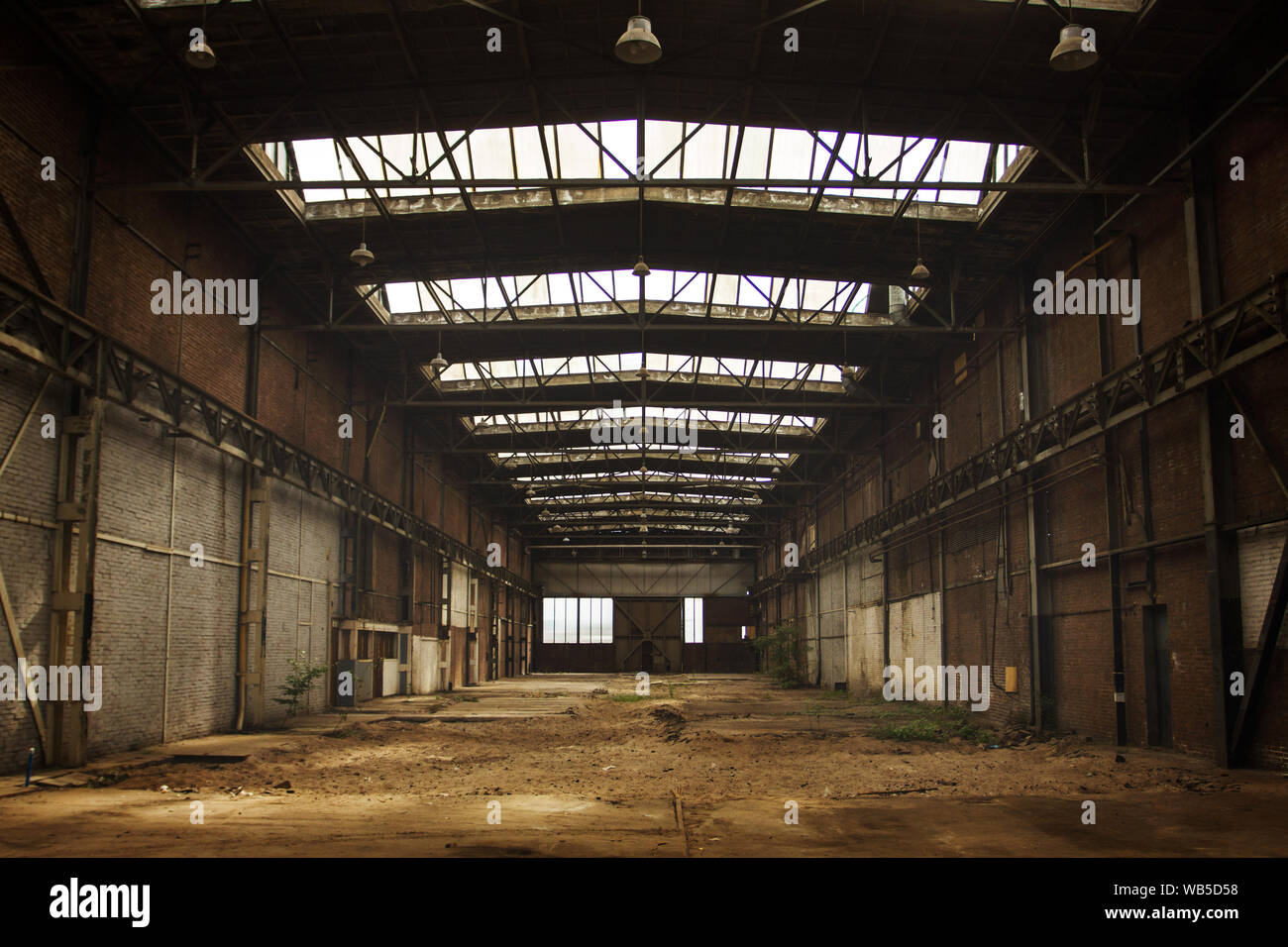 Abandoned empty old factory workshop interior with roof light Stock ...