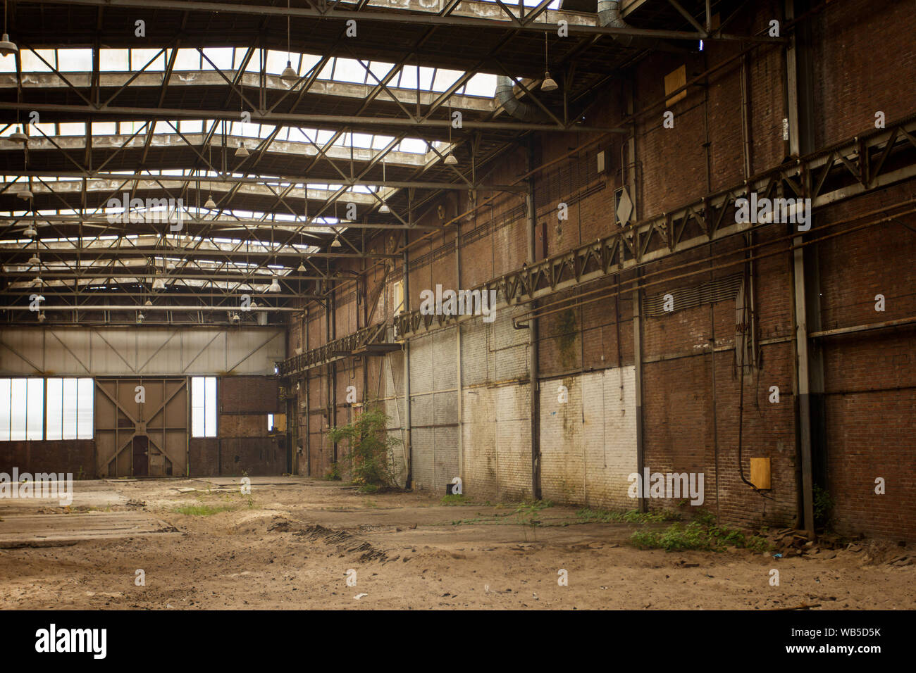 Abandoned empty old factory workshop interior with roof light Stock ...