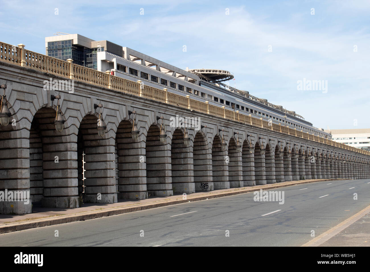 Arched bridge supporting rail tracks going over the River Seine Pont De ...