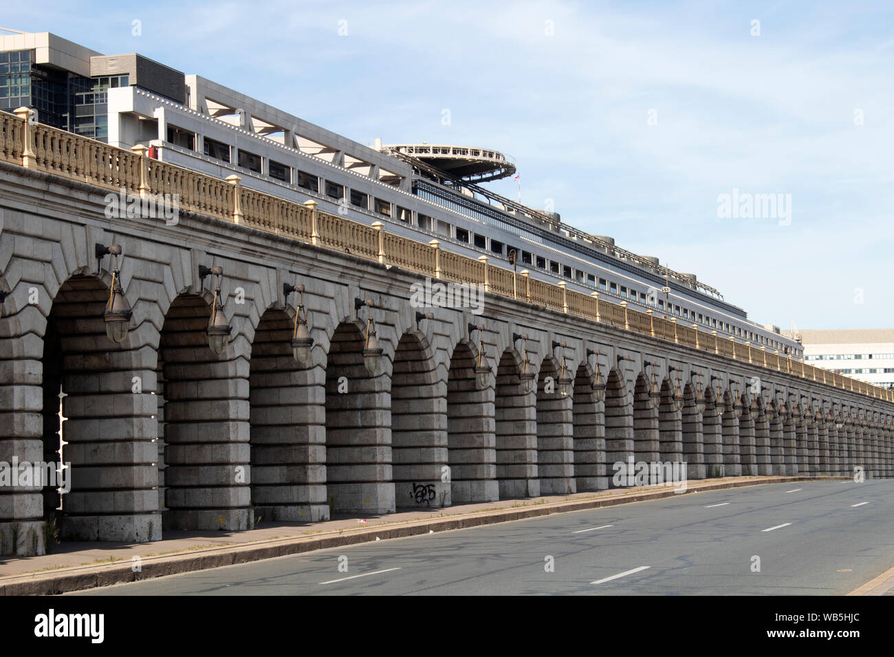 Arched bridge supporting rail tracks going over the River Seine Pont De ...
