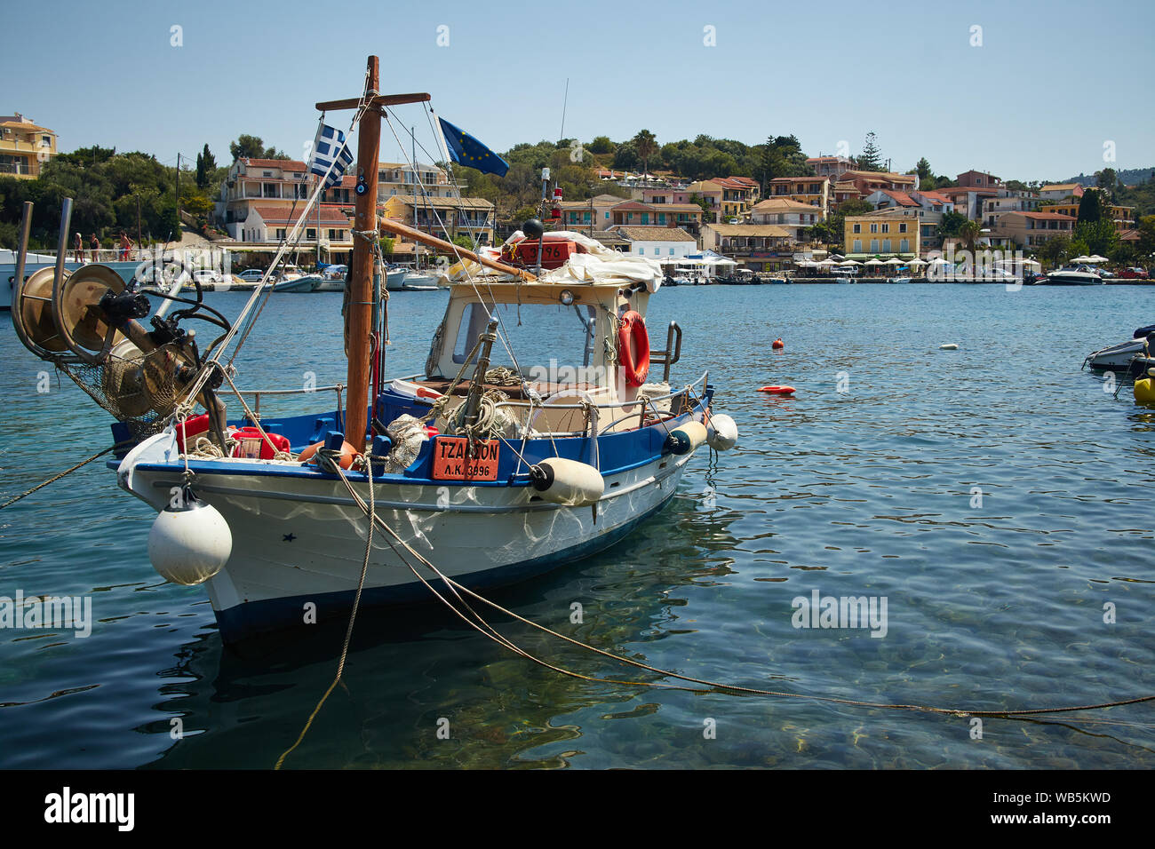 Fishing Boat in Kassiopi Harbour, Corfu, Greece Stock Photo - Alamy