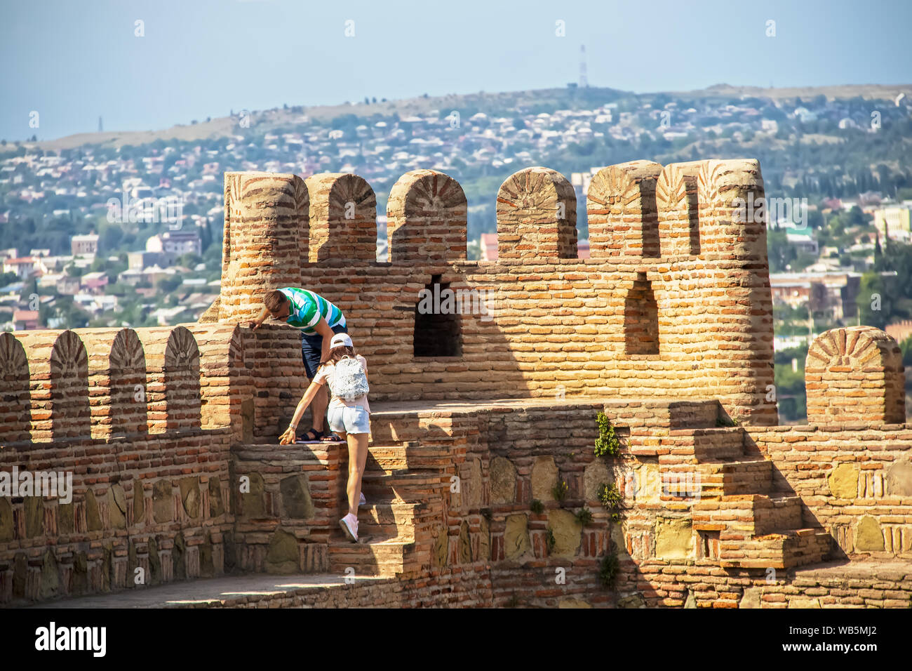 Helping hand mountain climbing hi-res stock photography and images - Alamy