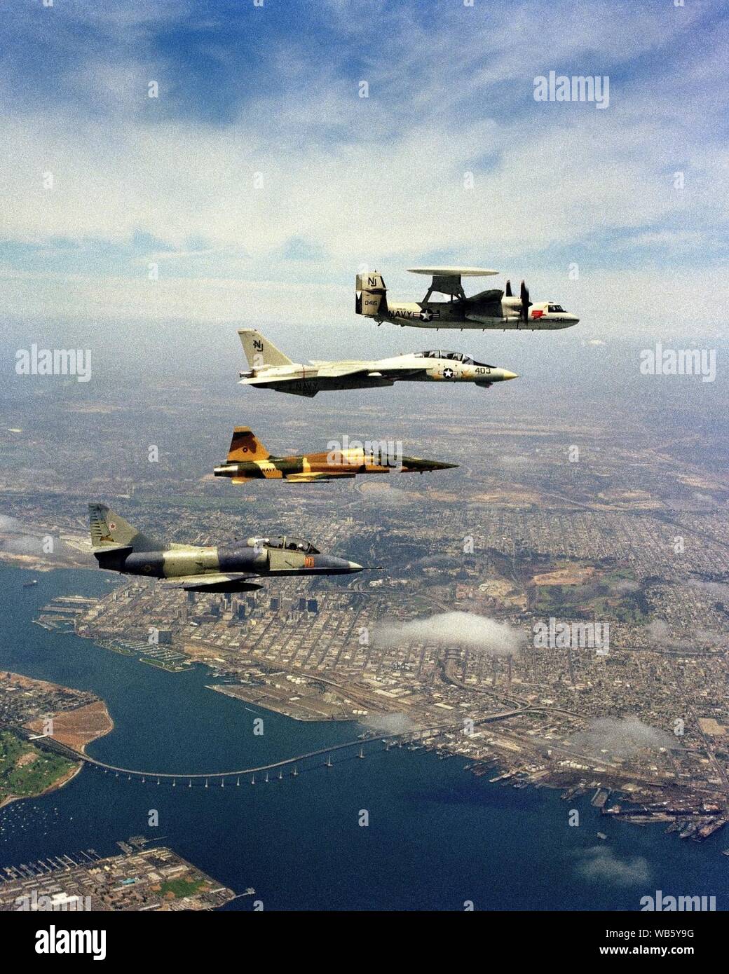 E-2C Hawkeye, F-14 Tomcat, F-5E Tiger II and TA-4 Skyhawk fly above San ...