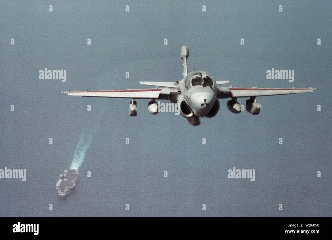 EA-6B Prowler of VAQ-137 in flight over USS America (CV-66) c1992 Stock ...